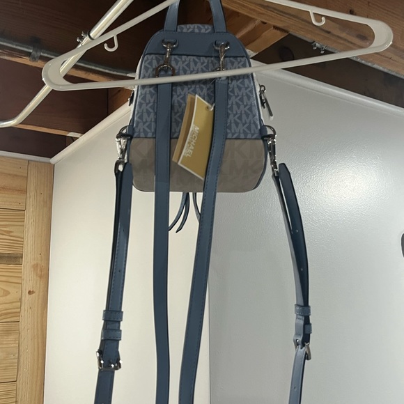 Michael Kors | Bags | Michael Kors Xs Rhea Zip Messenger Backpack ...